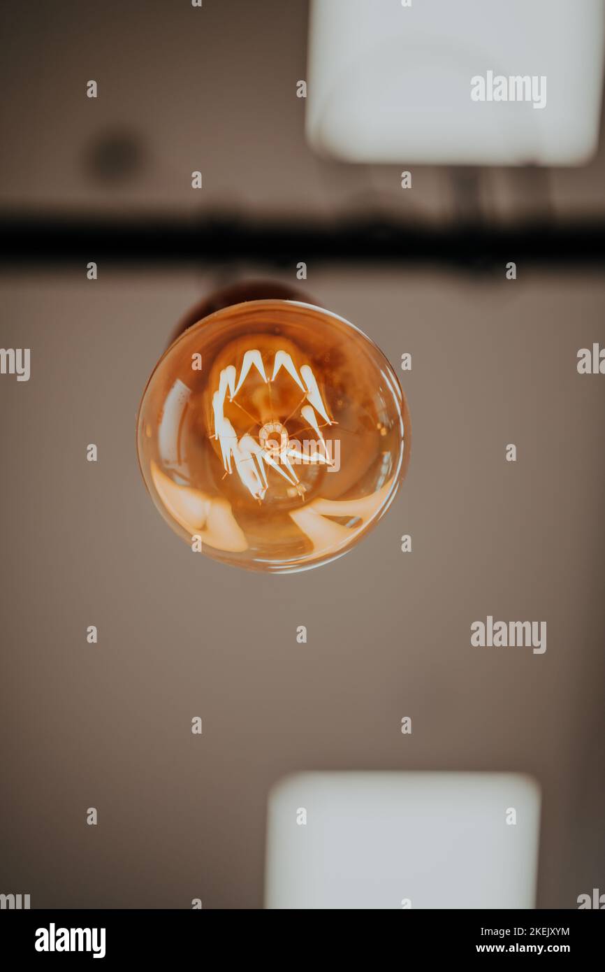 Light bulb illuminated and taken from above Stock Photo - Alamy