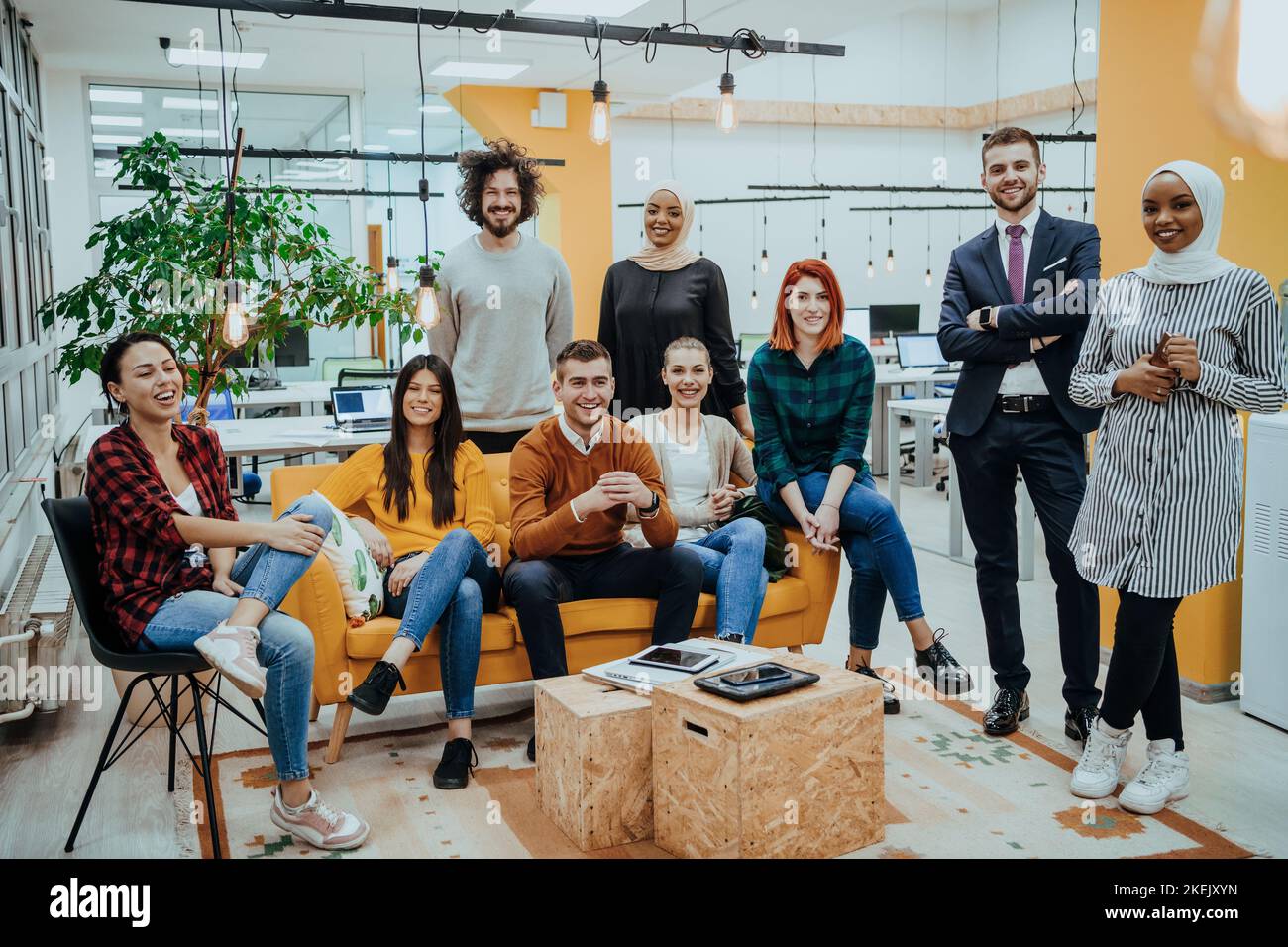 Group of multi-ethnic colleagues working on desktop computers, laptop ...