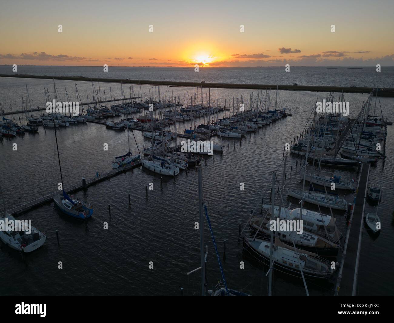 An aerial shot of a scenic sunset over the harbor Stock Photo - Alamy
