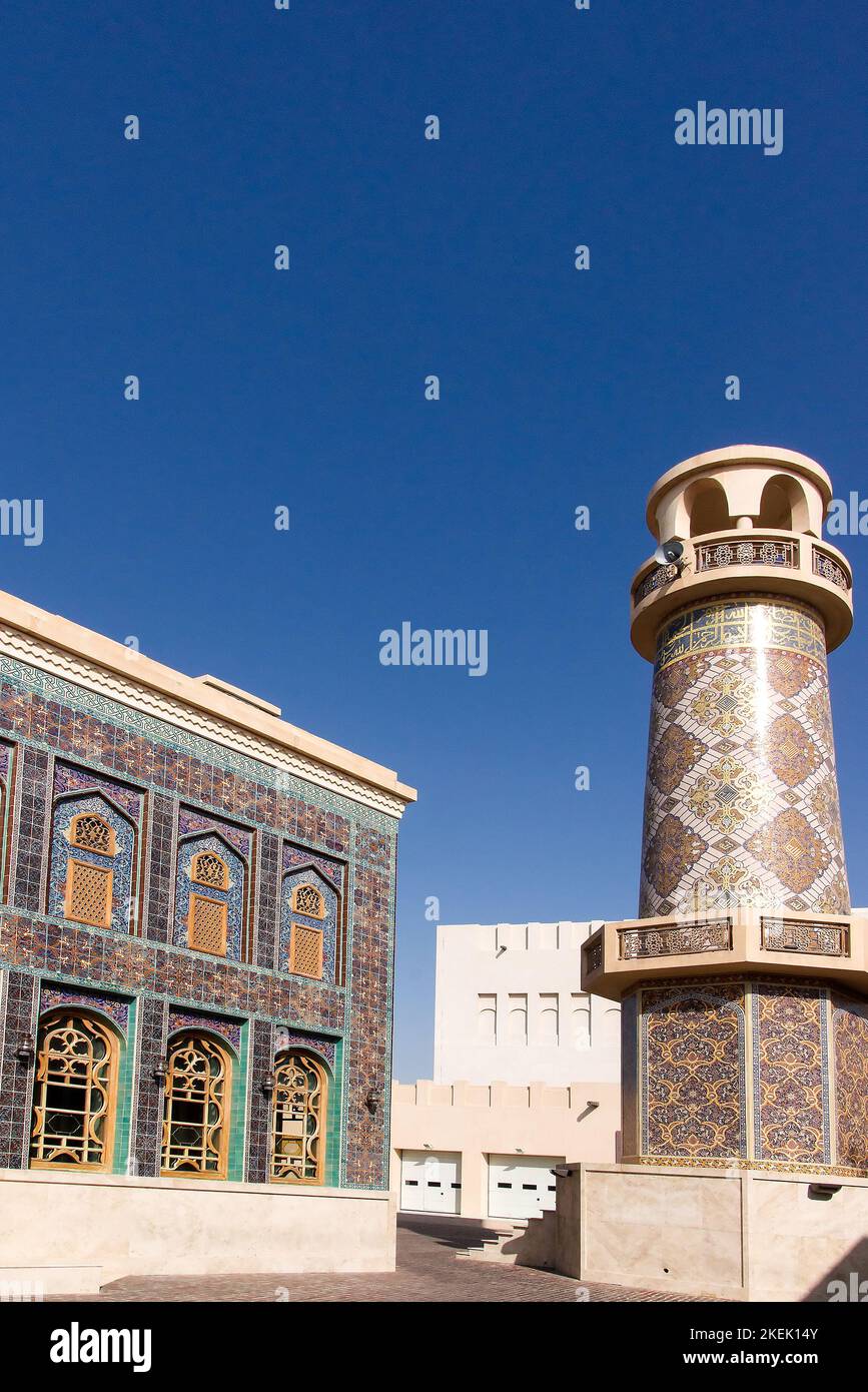 Building of the minaret is decorated with paintings of Katara Cultural ...