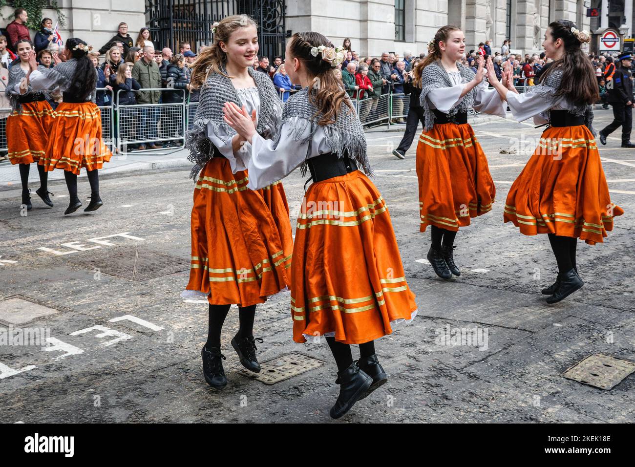 London, UK. 12th Nov, 2022. A dancing group takes part in the parade ...