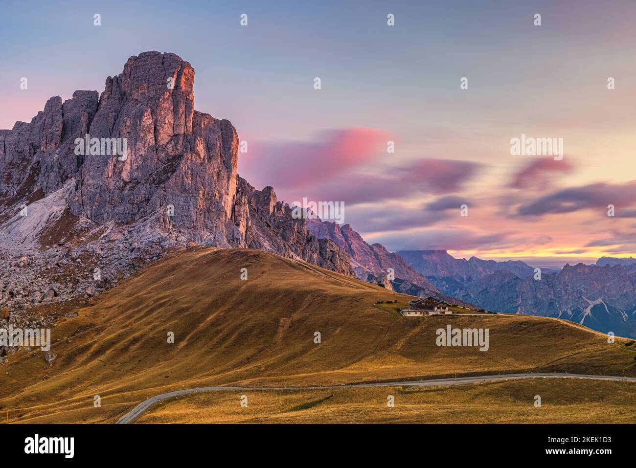 It is autumn in the Dolomites and a beautiful sunrise on the Giau Pass ...