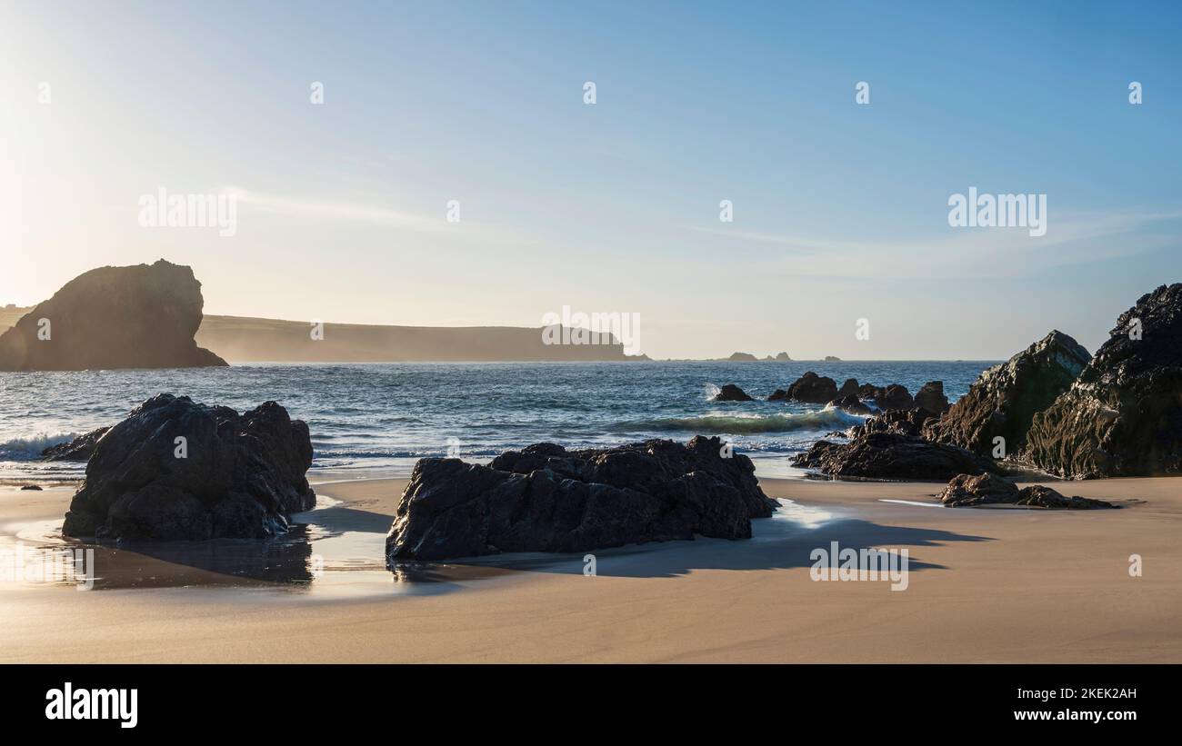 Stunning sunrise over Kynance Cove landscape in Cornwall England with ...