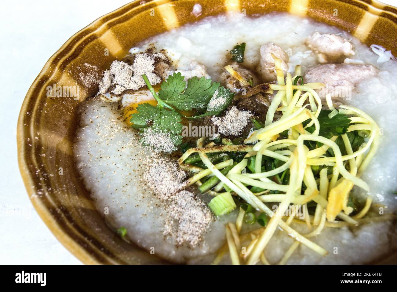 century egg congee is chinese food Stock Photo - Alamy