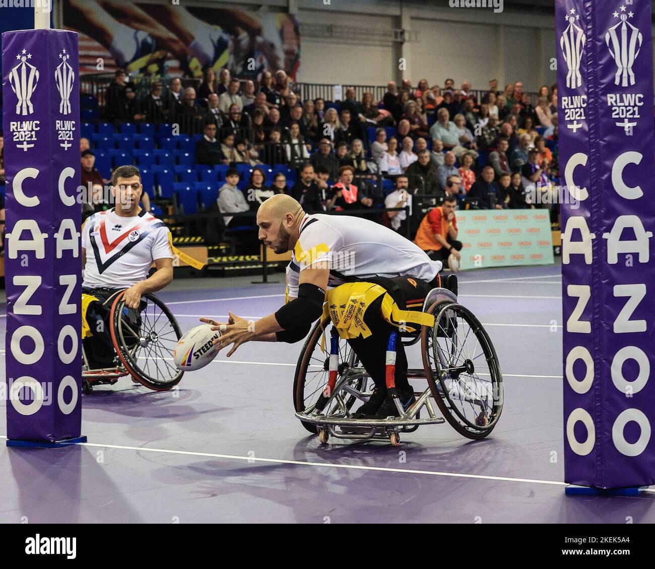 Jeremy Bourson of France goes over for a try during the Wheelchair ...