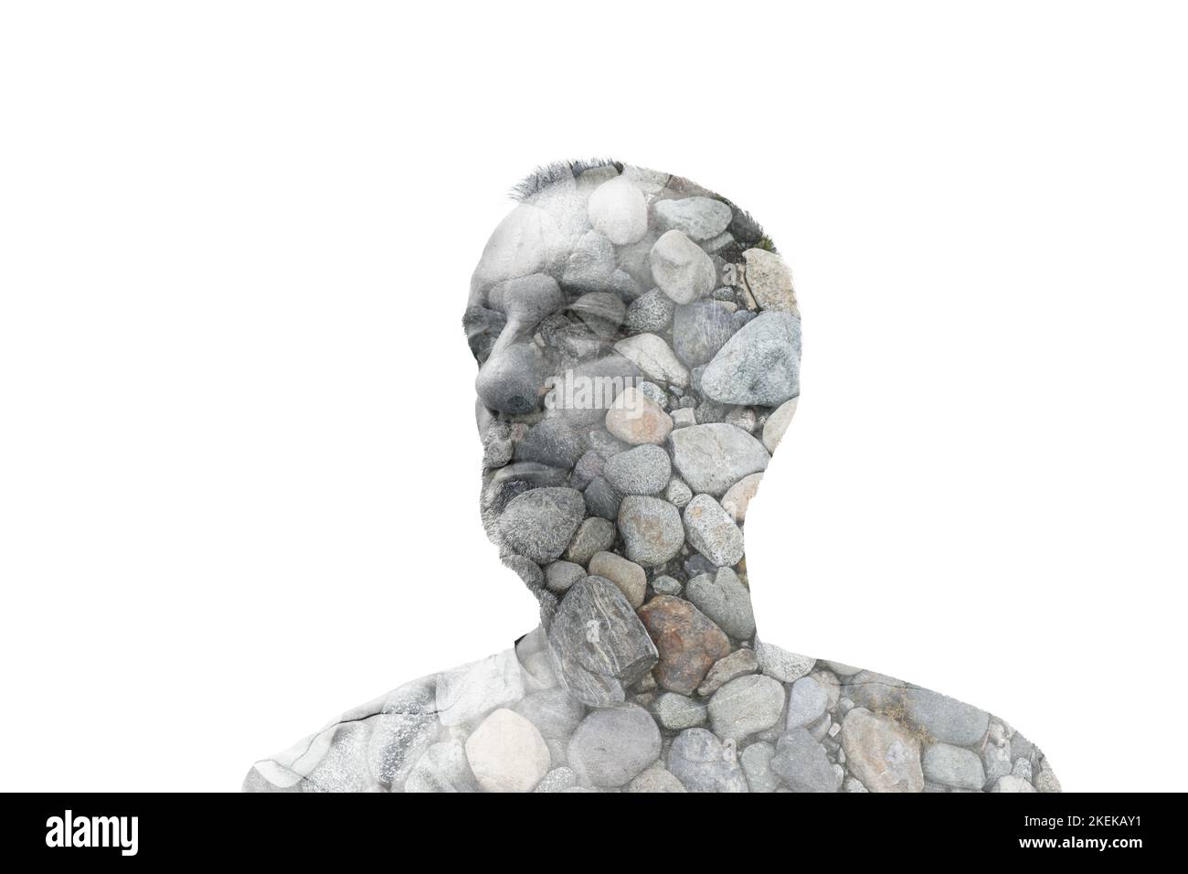 silhouette of an adult man superimposed on rocks in a river. double ...