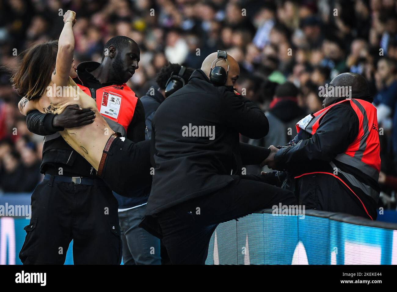 A member of the feminist activist group Femen ejected from stadium by ...
