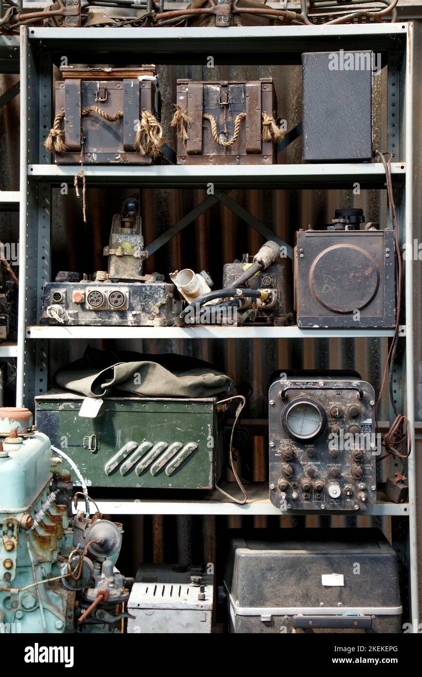 old military electrical equipment boxes and oscilloscope on metal ...