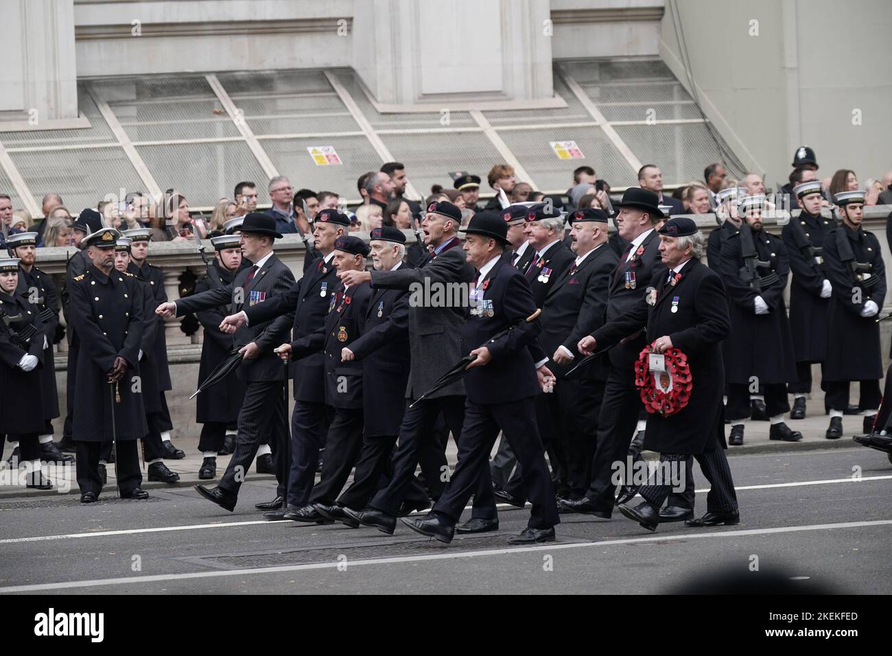 Veterans march during Remembrance Sunday service at the Cenotaph, in ...