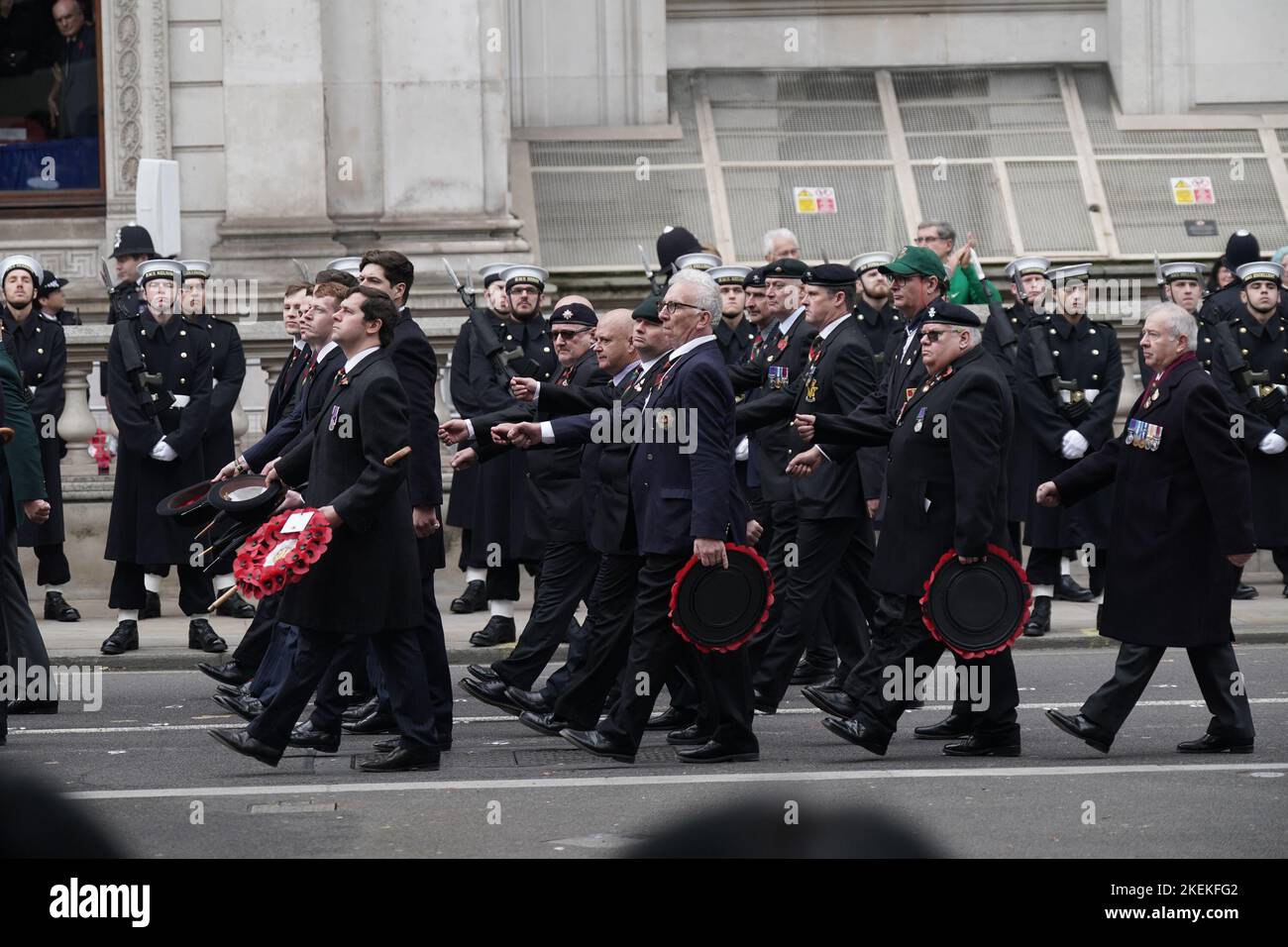 Veterans march during Remembrance Sunday service at the Cenotaph, in ...