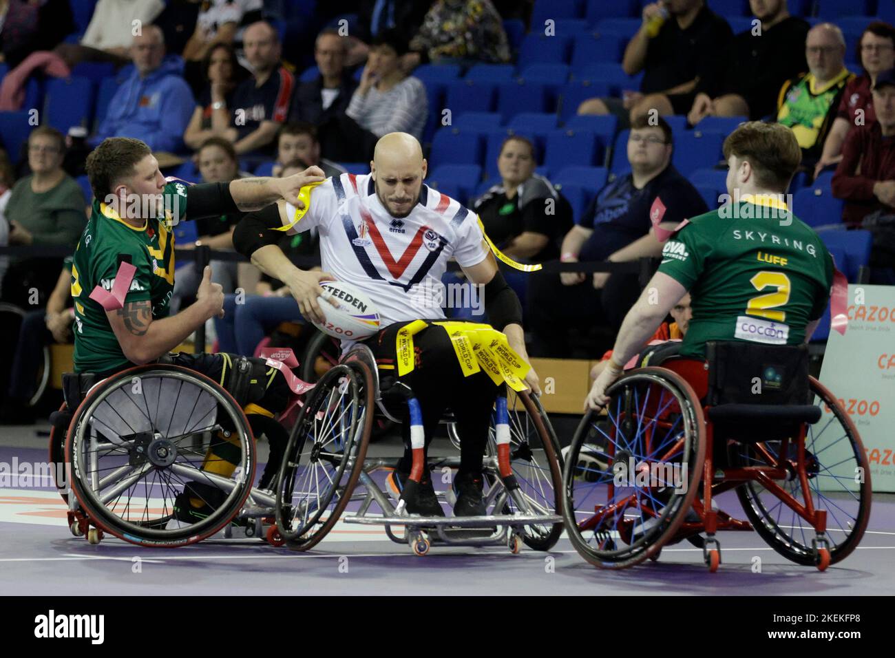 Australia's Diab Karim (left) tackles France's Jeremy Bourson during ...