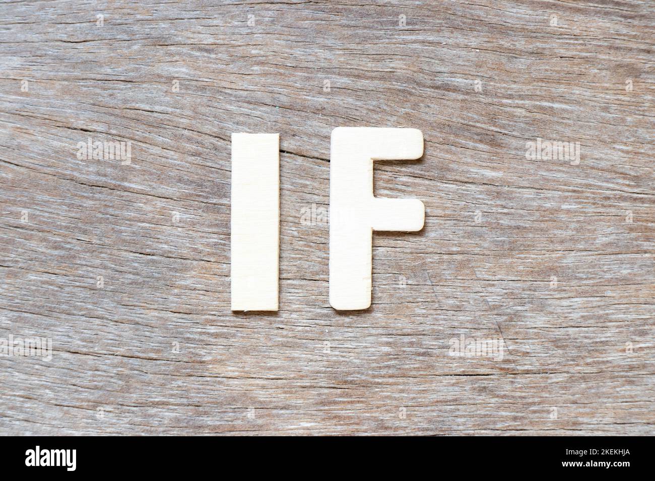 Alphabet letter in word if on wood background Stock Photo - Alamy