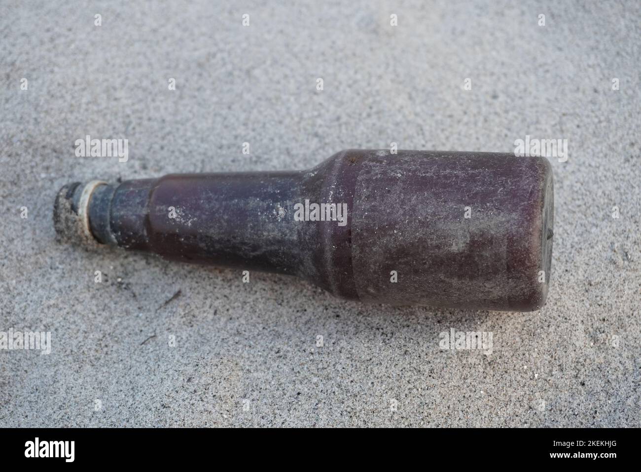 bottle isolated on sand Stock Photo - Alamy