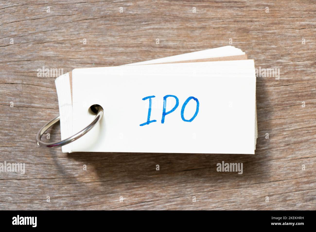 Flash card with handwriting in word IPO (Abbreviation of Initial Public ...