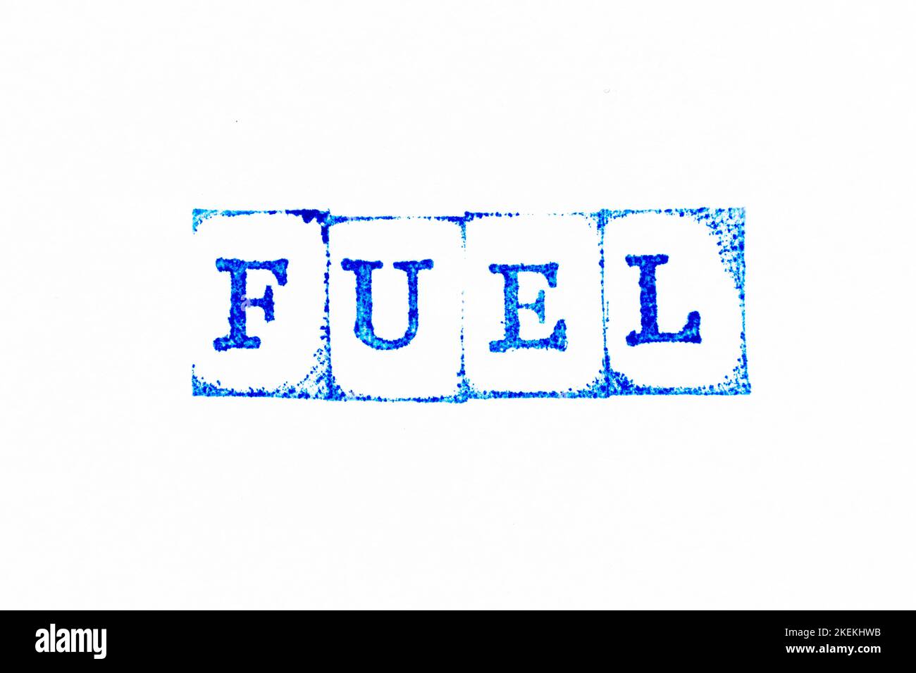 Blue color ink rubber stamp in word fuel on white paper background ...