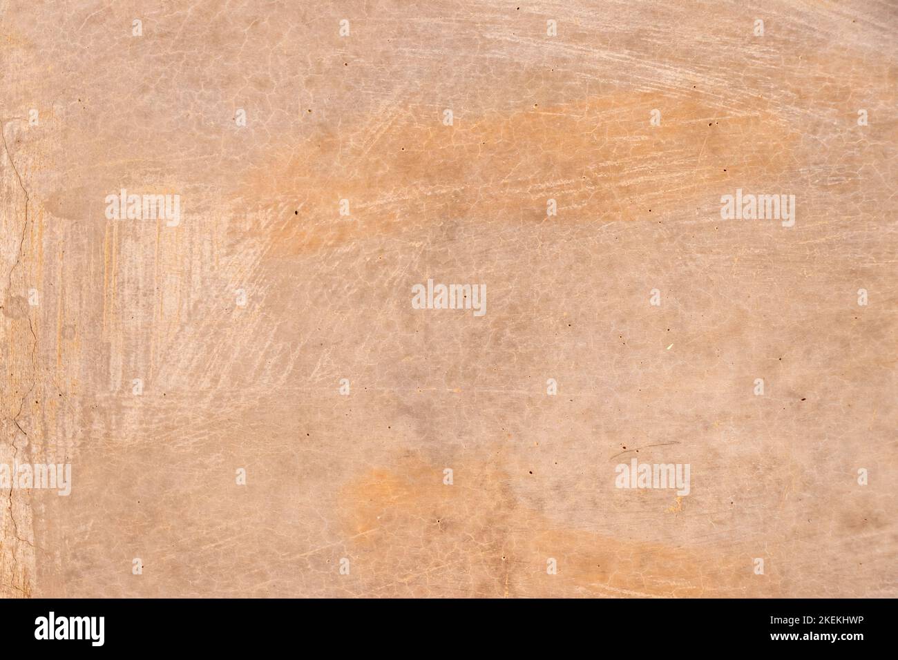 Orange color of grunge concrete textured background with copy space for ...