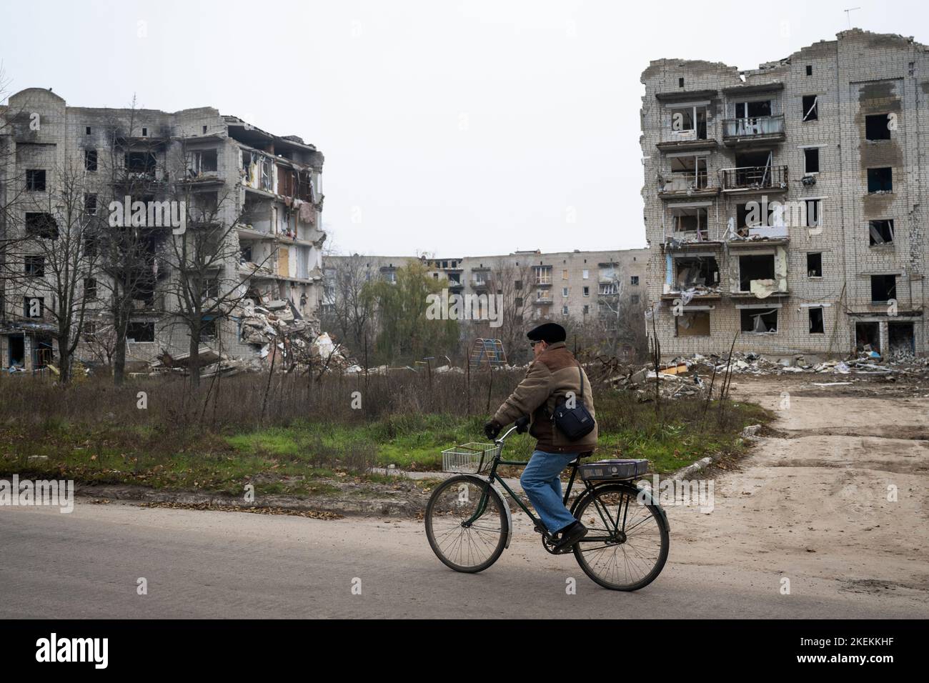 Izyum, Izium, Ukraine. 09th Nov, 2022. A man drives past a destroyed ...