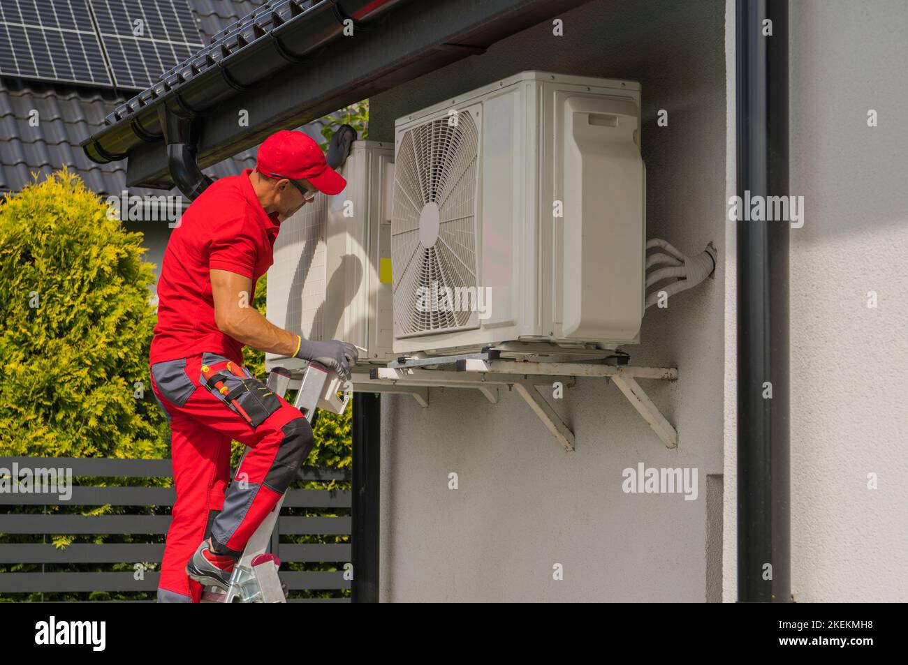 Professional Caucasian HVAC Worker in His 40s Performing Heat Pump and ...