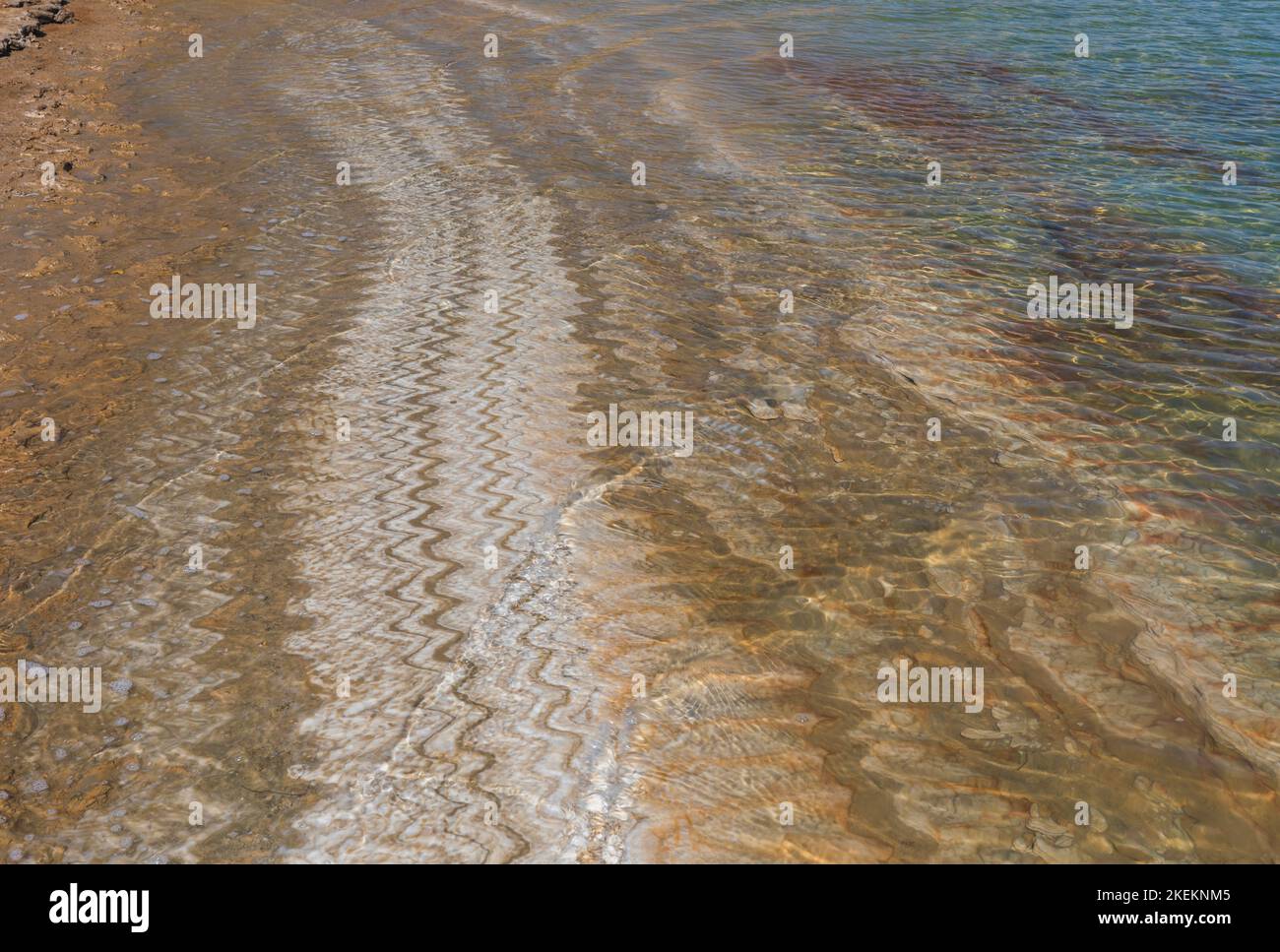 Mud and layers of salt on the coast of the Dead Sea in Israel Stock ...