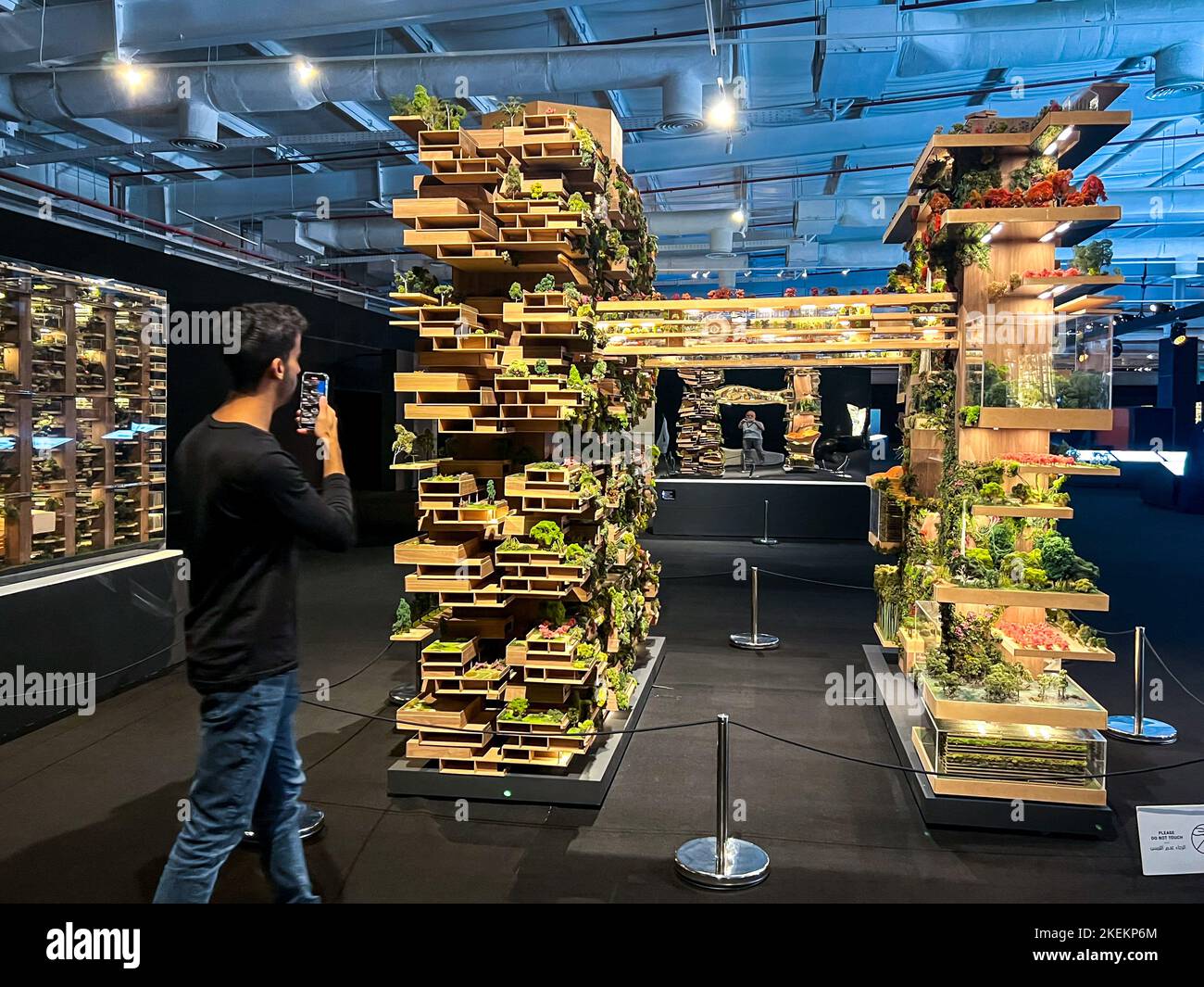 Visitors discover images and models of ’The Line’ project, during a new ...