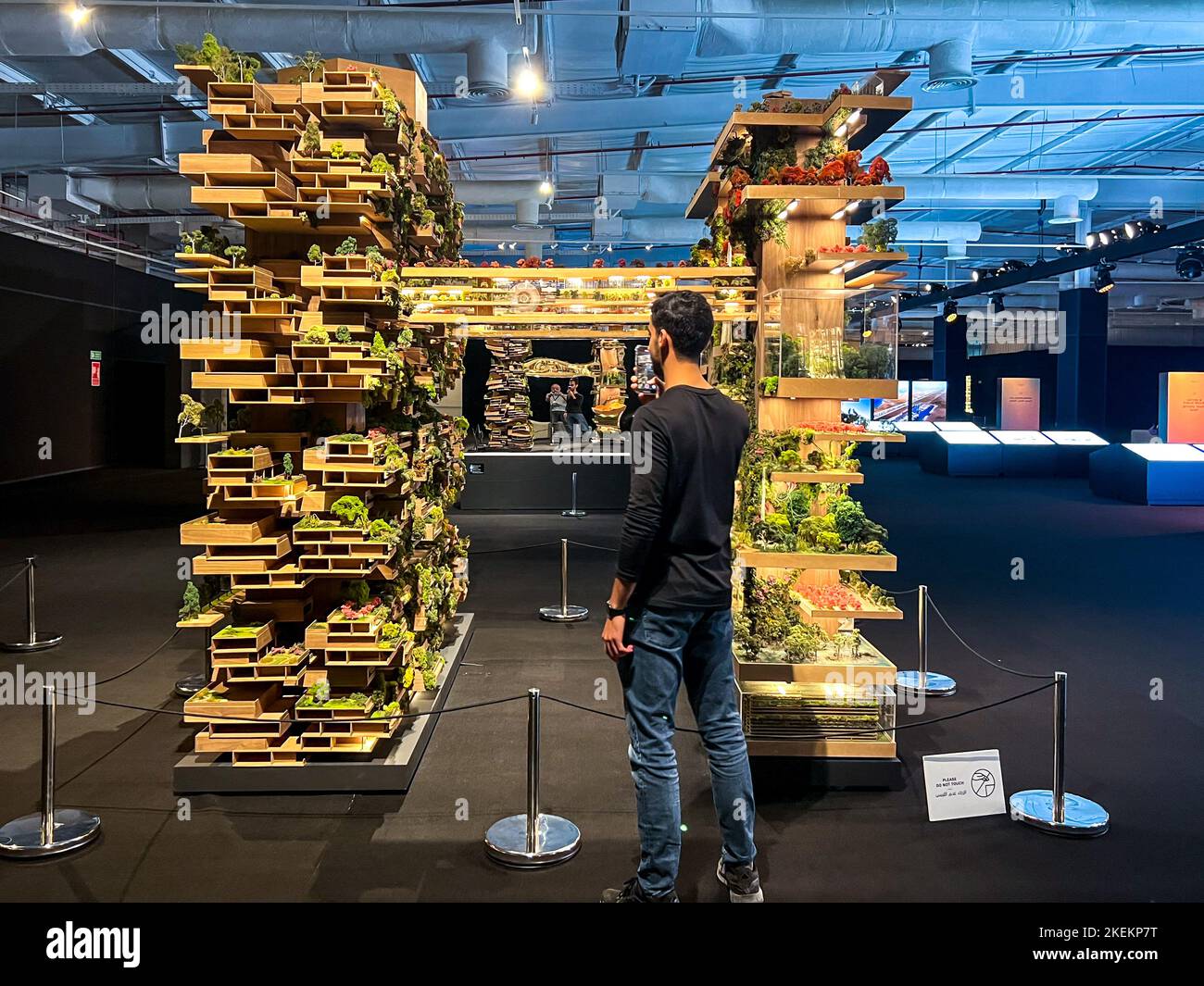 Visitors discover images and models of ’The Line’ project, during a new ...