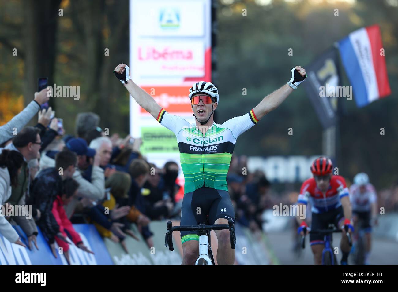 Belgian Laurens Sweeck celebrates as he crosses the finish line to win ...