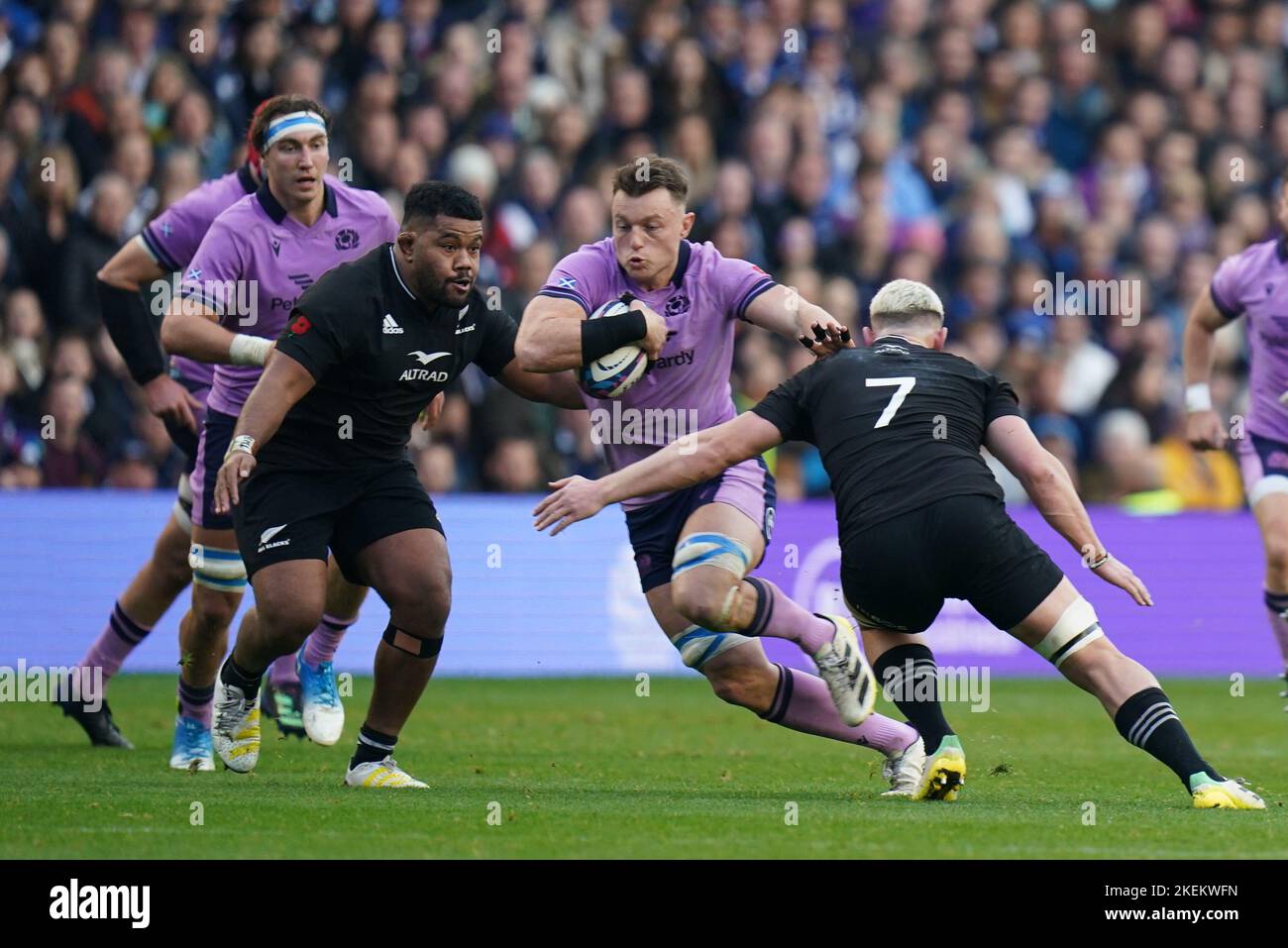 Scotland’s Jack Dempsey is tackled by New Zealand’s Dalton Papalii (7 ...