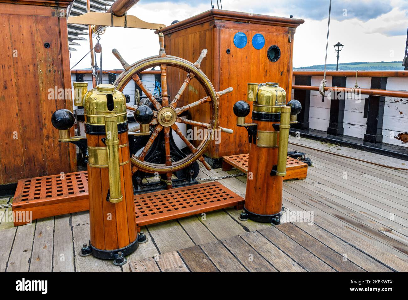 The wheel and two compass binnacles on the upper deck of the RRS ...