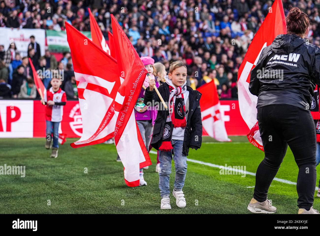 Rotterdam - A kid with a flag during the match between Feyenoord v ...