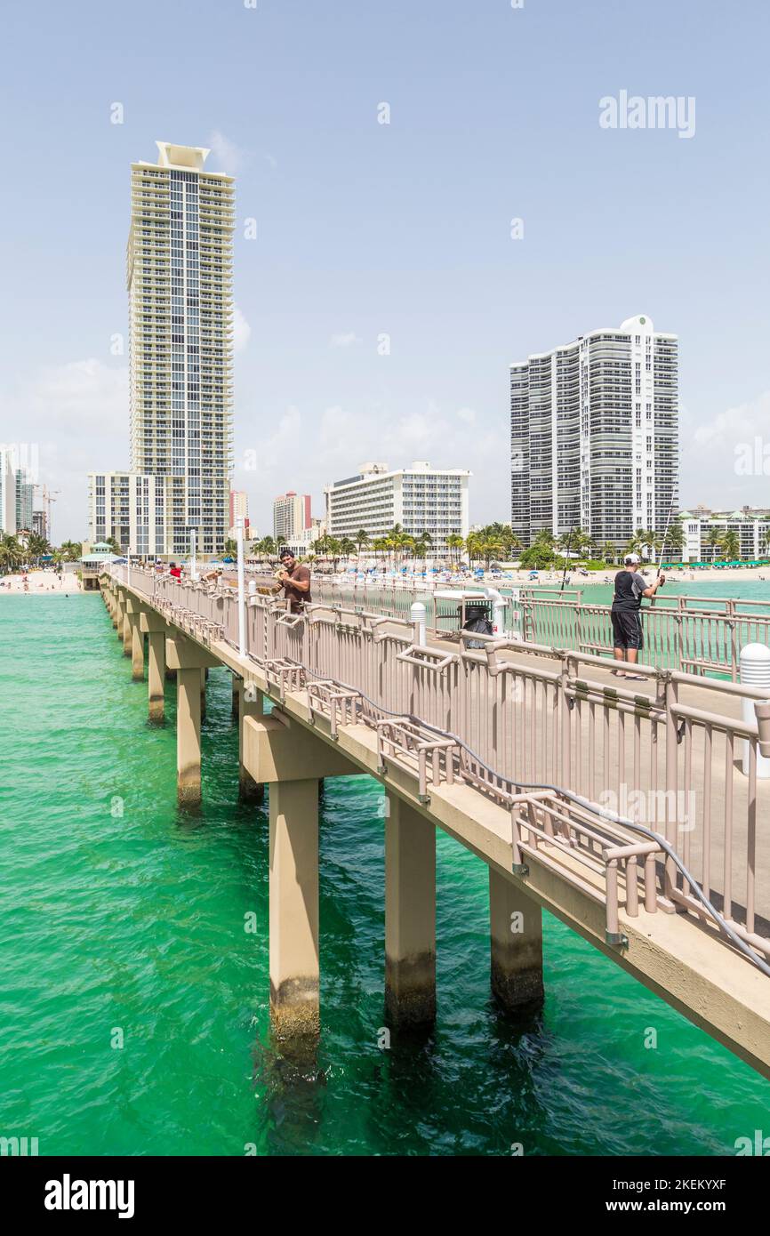 Sunny Isles Beach, USA - August 17, 2014: people at pier on Jade beach ...
