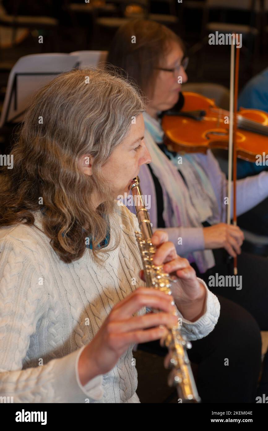 Flautist and viola player rehearsing a piece with the COMA ...