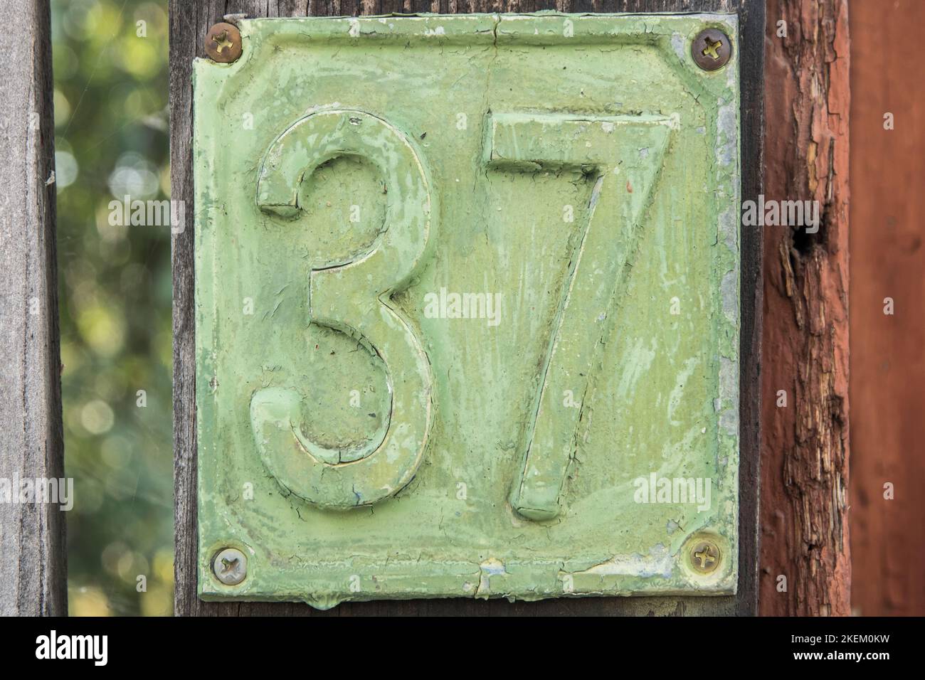 Old retro weathered cast iron plate with number 37 closeup Stock Photo ...