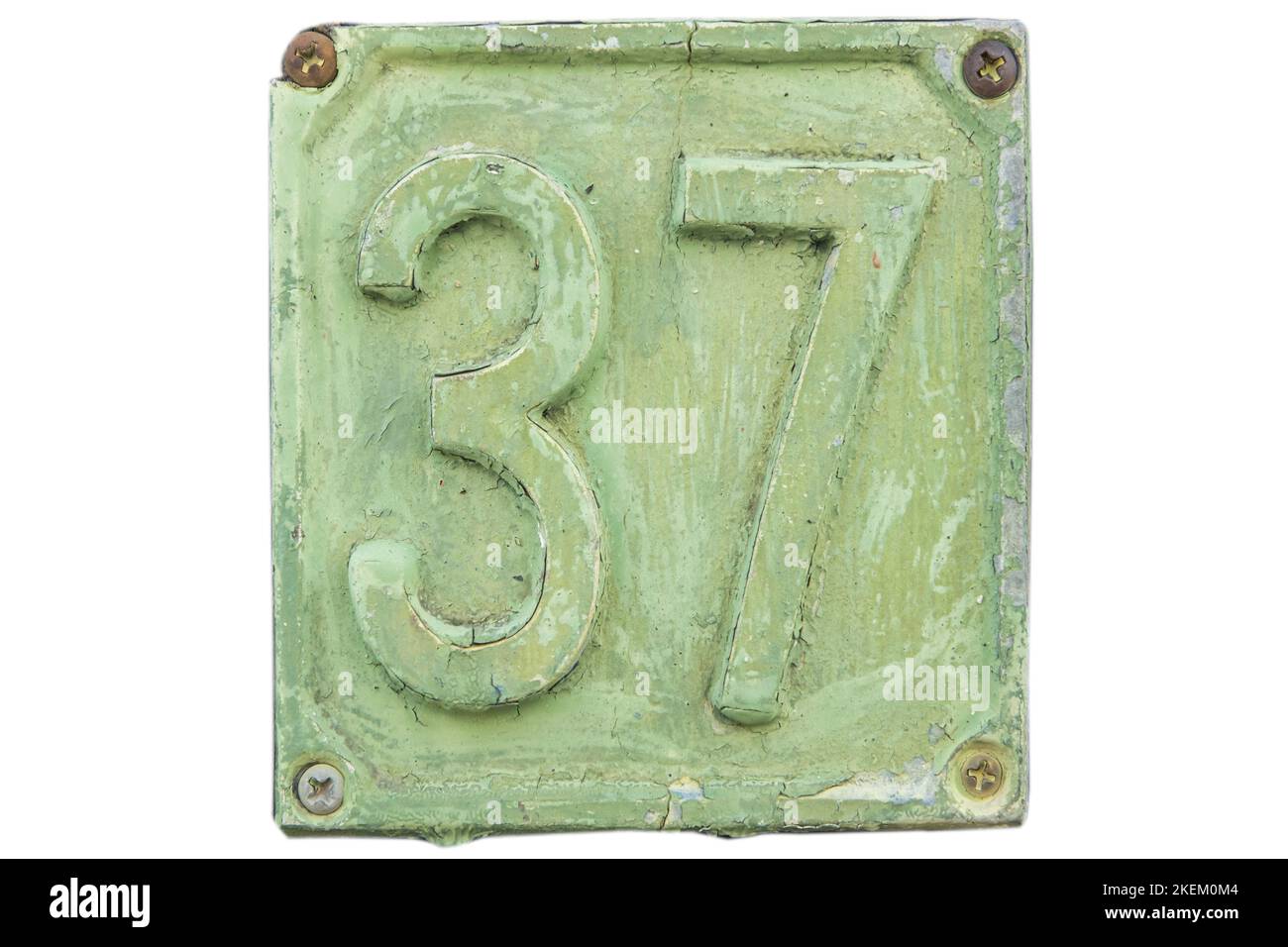 Old retro weathered cast iron plate with number 37 closeup isolated on ...