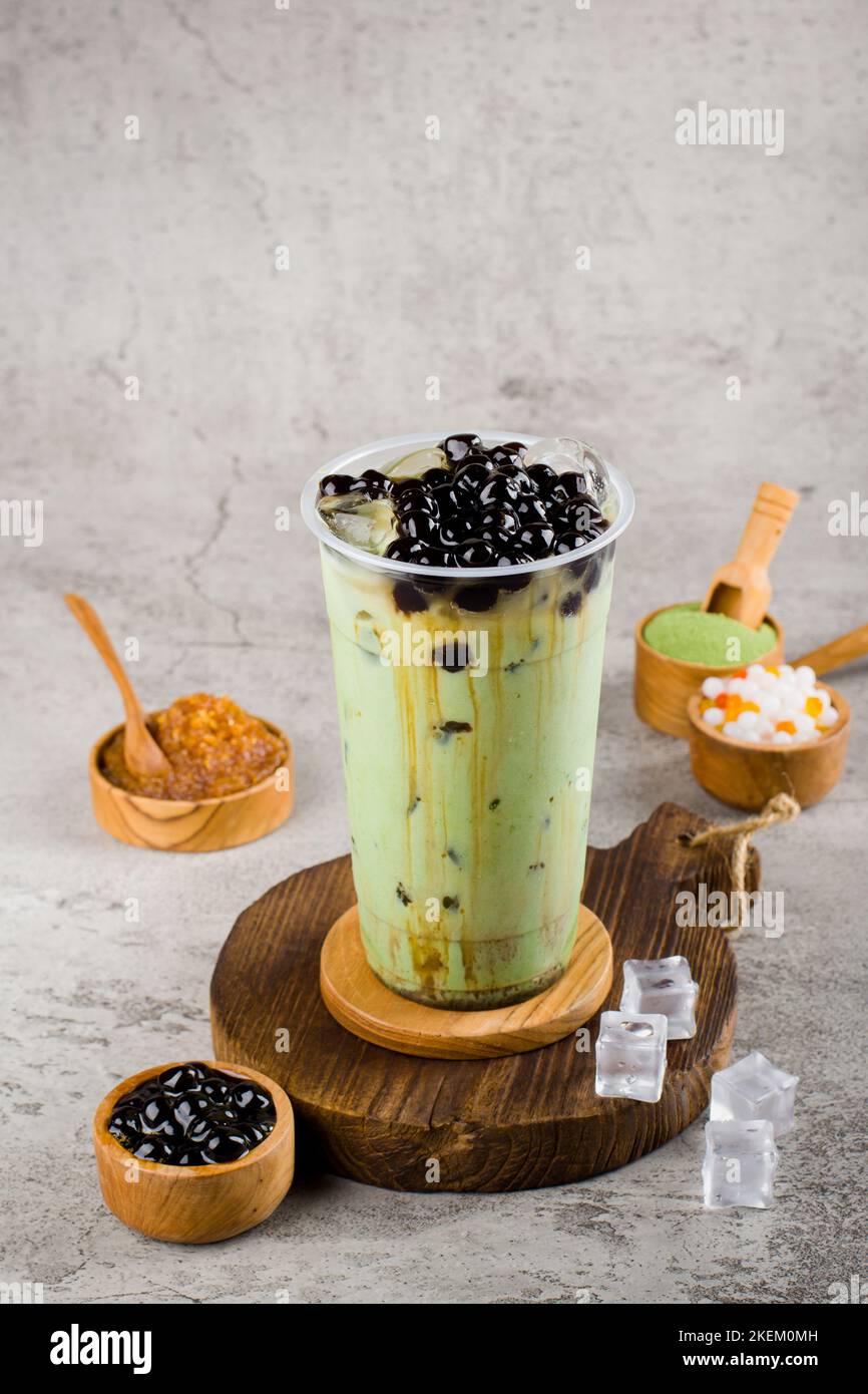 Boba or tapioca pearls is taiwan bubble milk tea in plastic cup with ...
