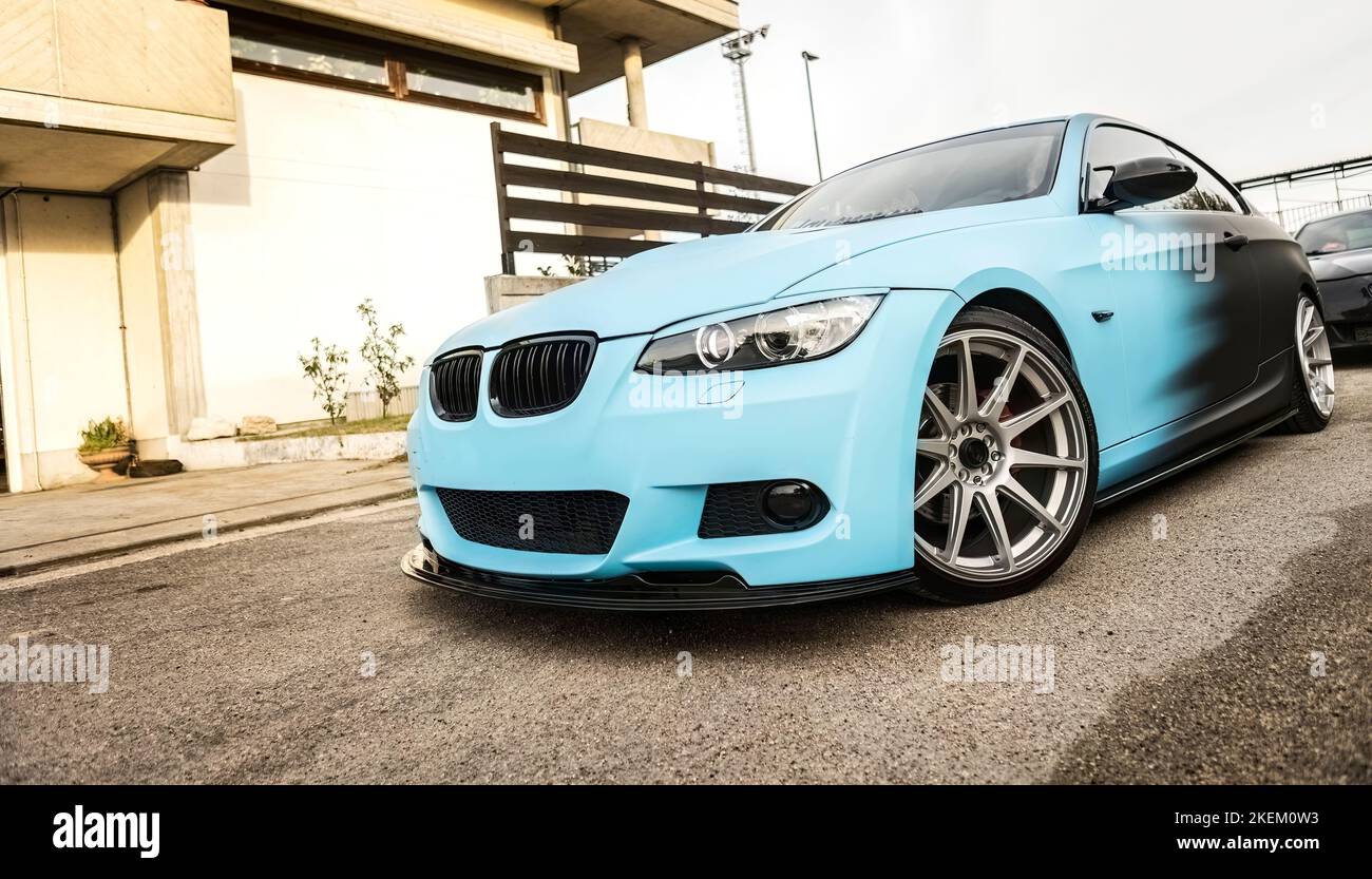 Tuned luxury car parked in the driveway Stock Photo - Alamy