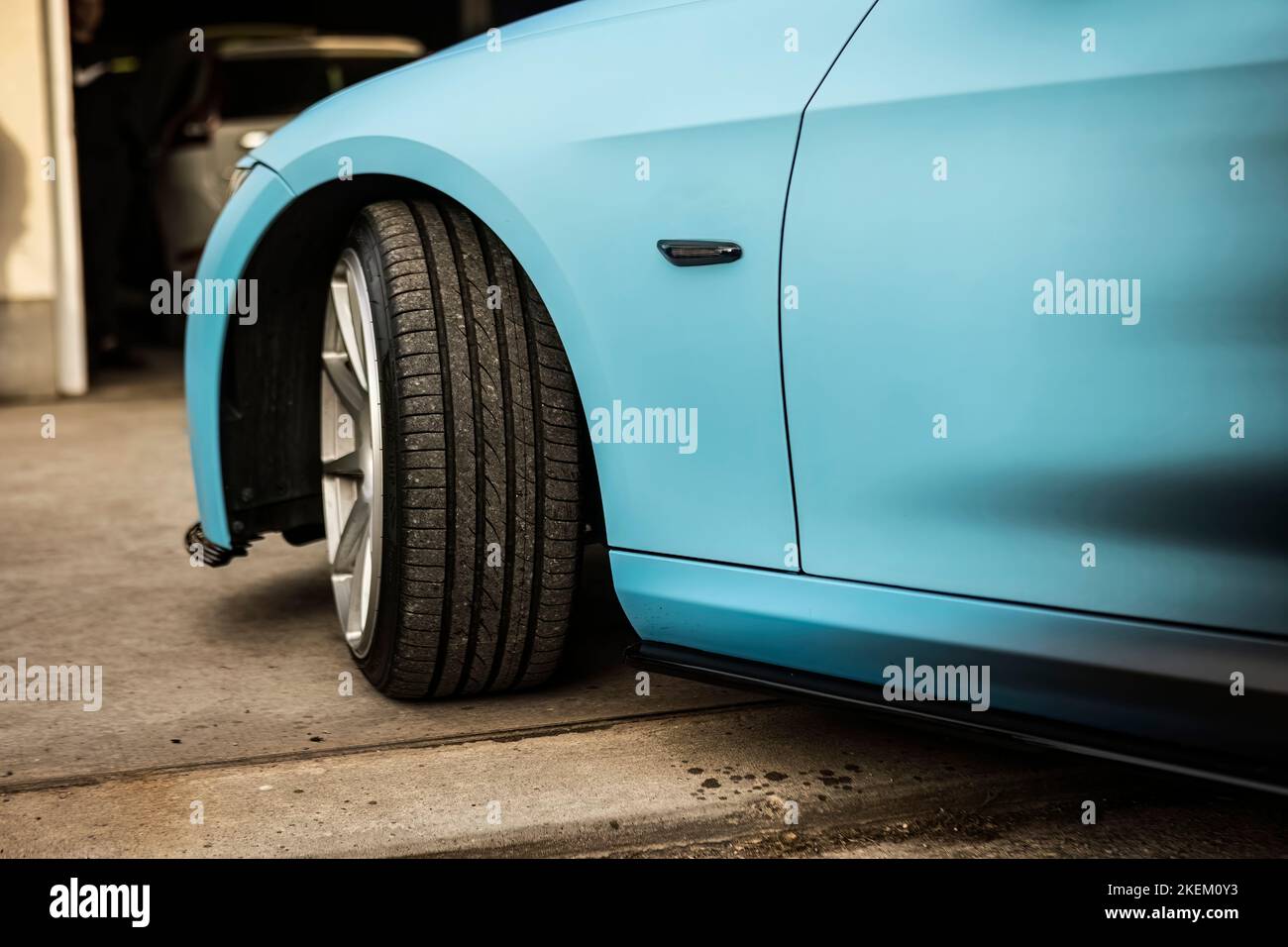 Tuned sport car tire detail Stock Photo - Alamy