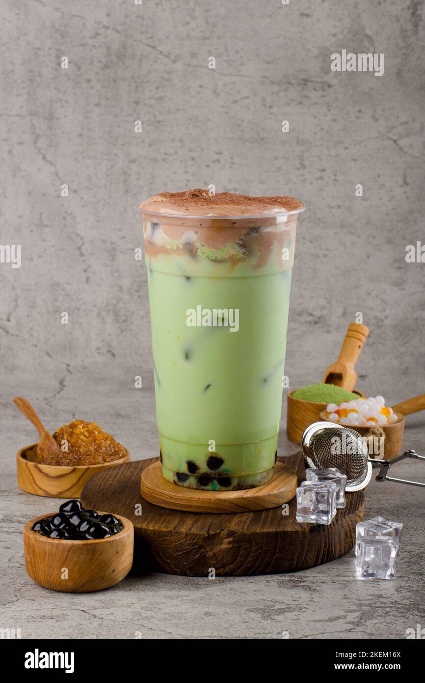 Boba or tapioca pearls is taiwan bubble milk tea in plastic cup with ...