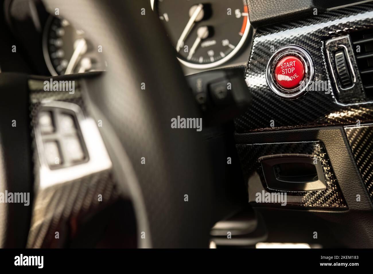 Red engine start button detail. Car dashboard with focus on red engine ...