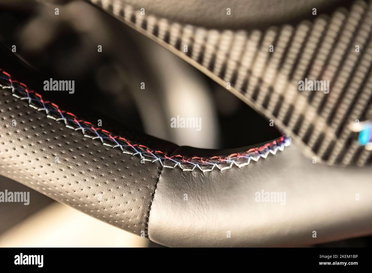 Luxury sport car steering wheel stitching detail Stock Photo - Alamy