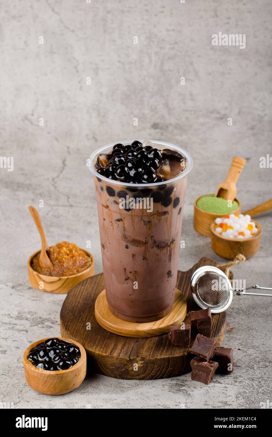 Boba or tapioca pearls is taiwan bubble milk tea in plastic cup with ...