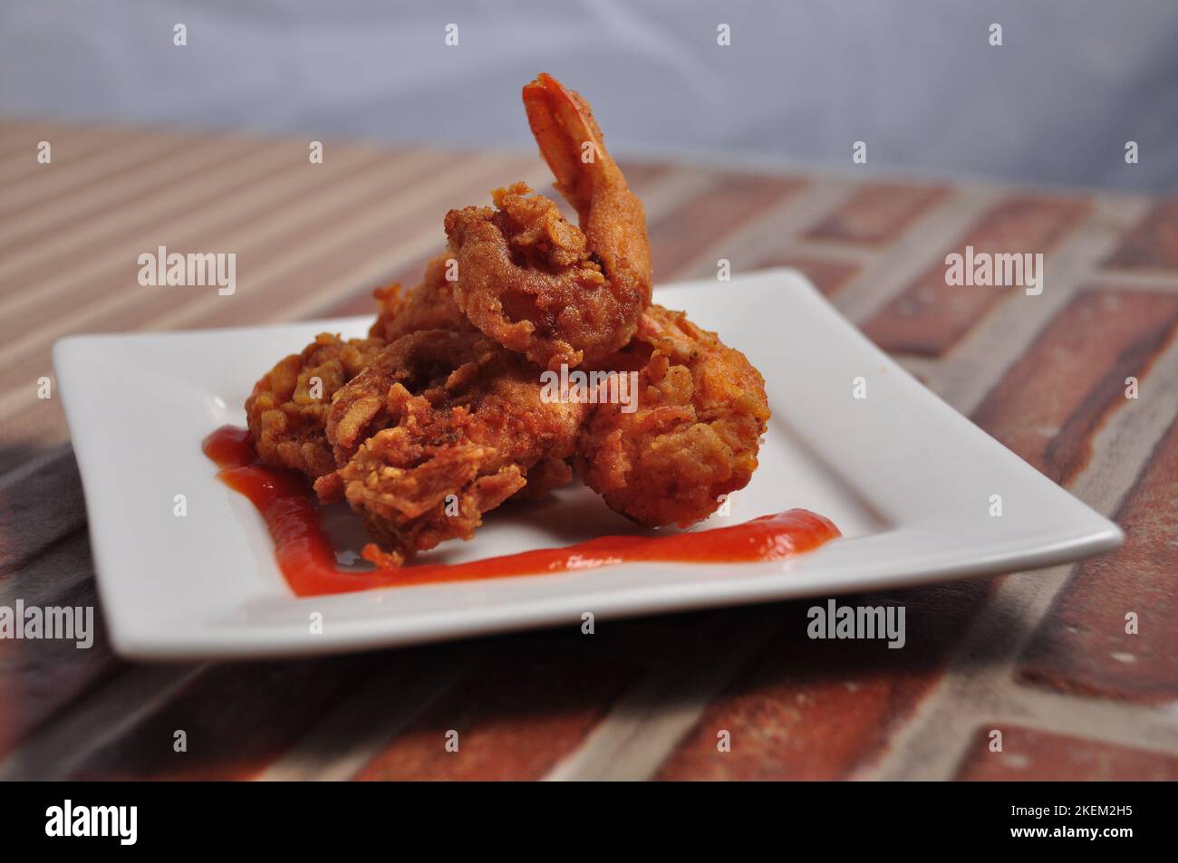 Flour coated fried fish hi-res stock photography and images - Alamy