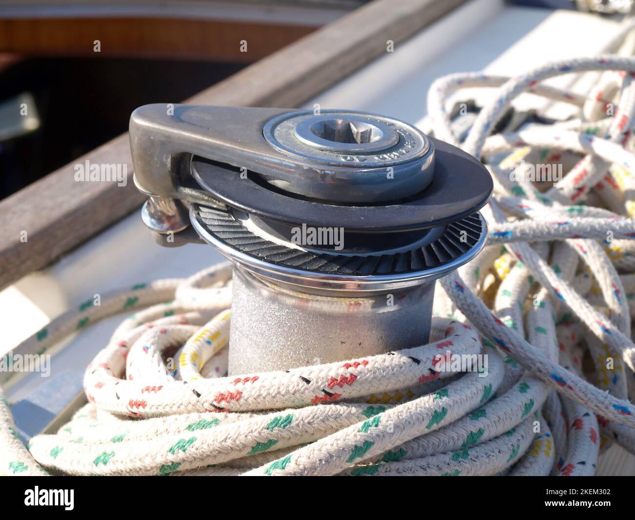 Rope laid around a winch on a sailing boat Stock Photo - Alamy