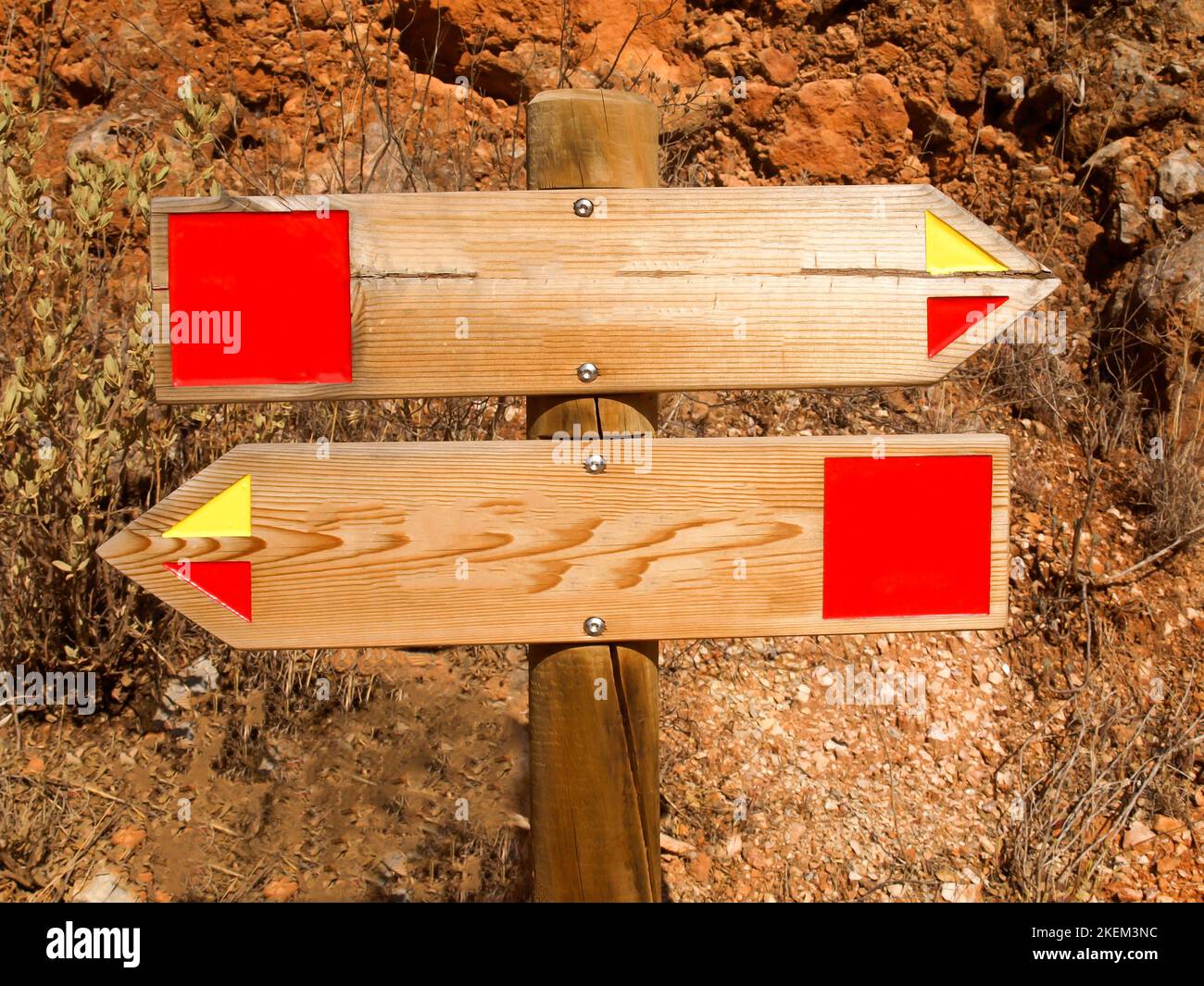 Wooden signs show in the opposite direction. Picture taken near ...