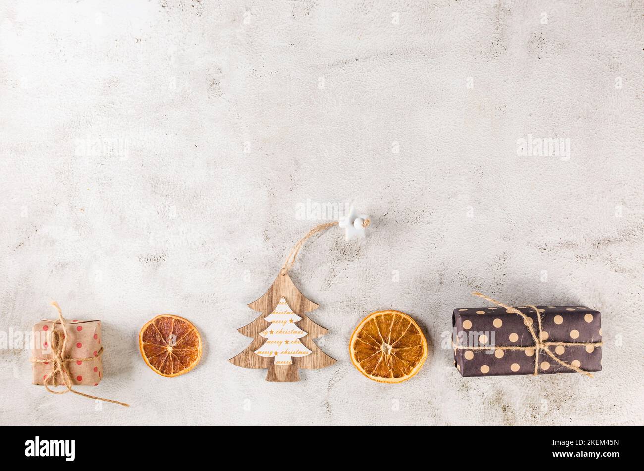 Christmas wrapped presents in kraft paper with different organic ...