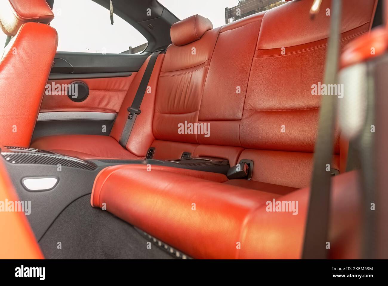 Red leather seat interior detail Stock Photo - Alamy