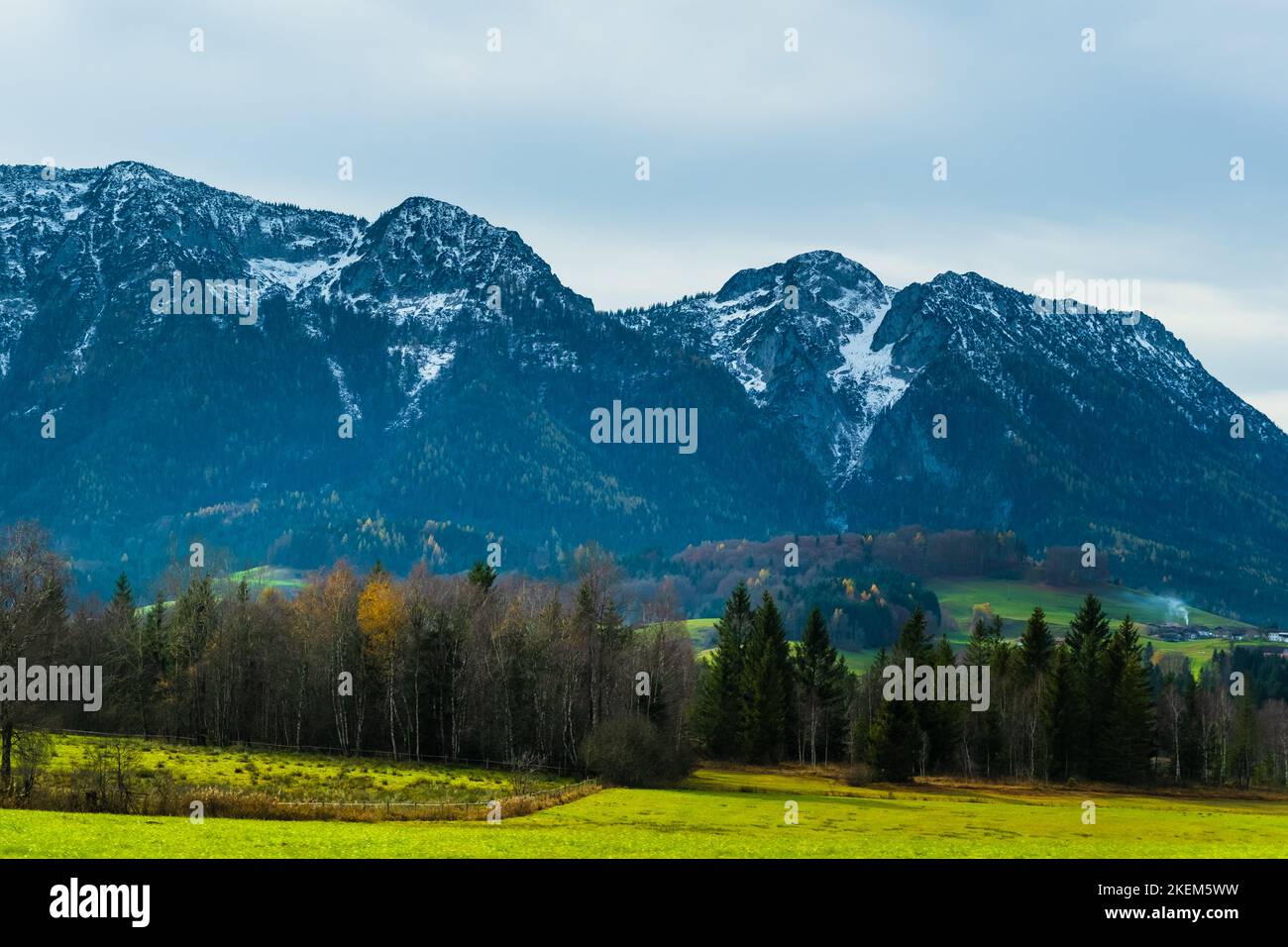 Austrian alps, Green meadows, alpine cottages and mountains Stock Photo ...