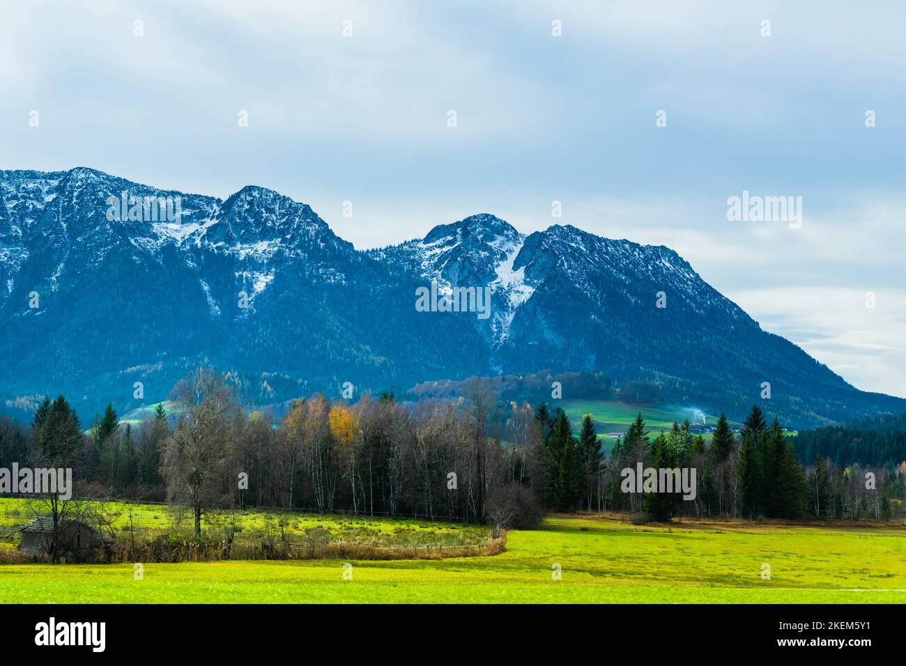 Austrian alps, Green meadows, alpine cottages and mountains Stock Photo ...