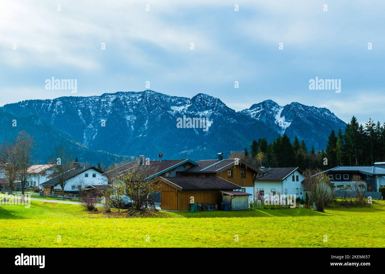 Austrian alps, Green meadows, alpine cottages and mountains Stock Photo ...