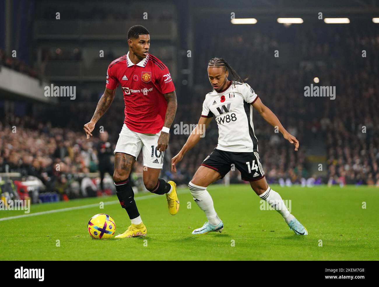 Manchester United's Marcus Rashford (left) and Fulham's Bobby Reid ...