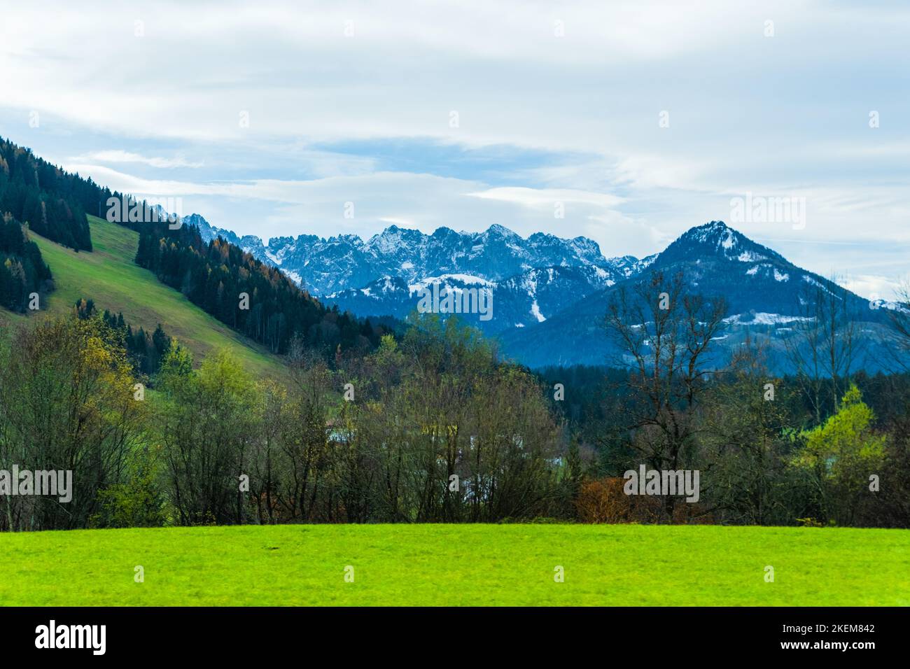 Austrian alps, Green meadows, alpine cottages and mountains Stock Photo ...